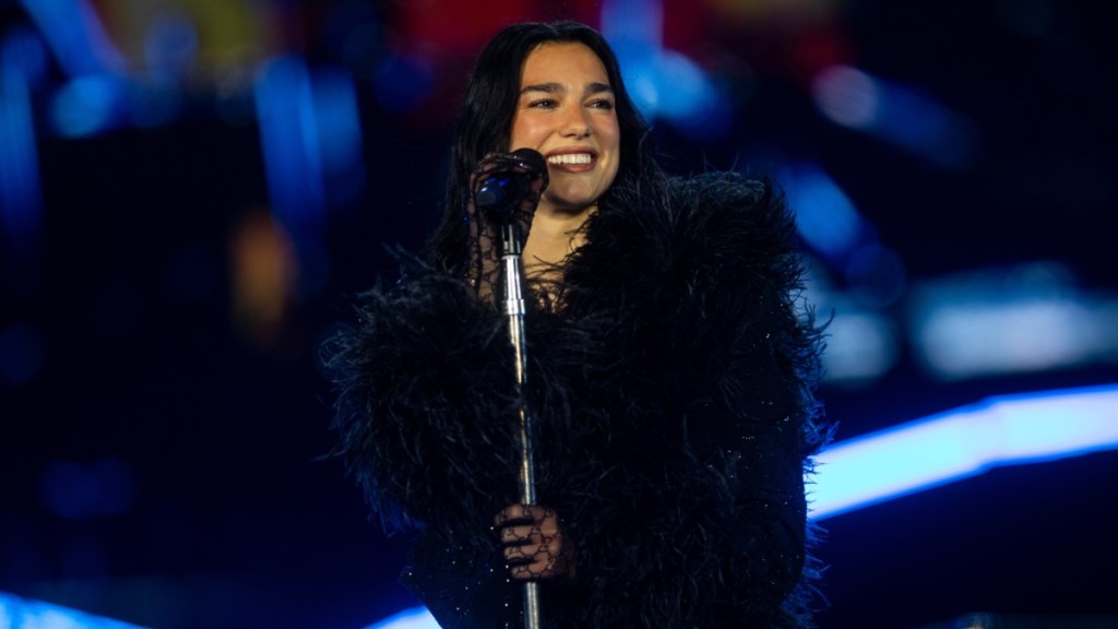 Dua Lipa's Red Lace Top Look Deserves Second Glance