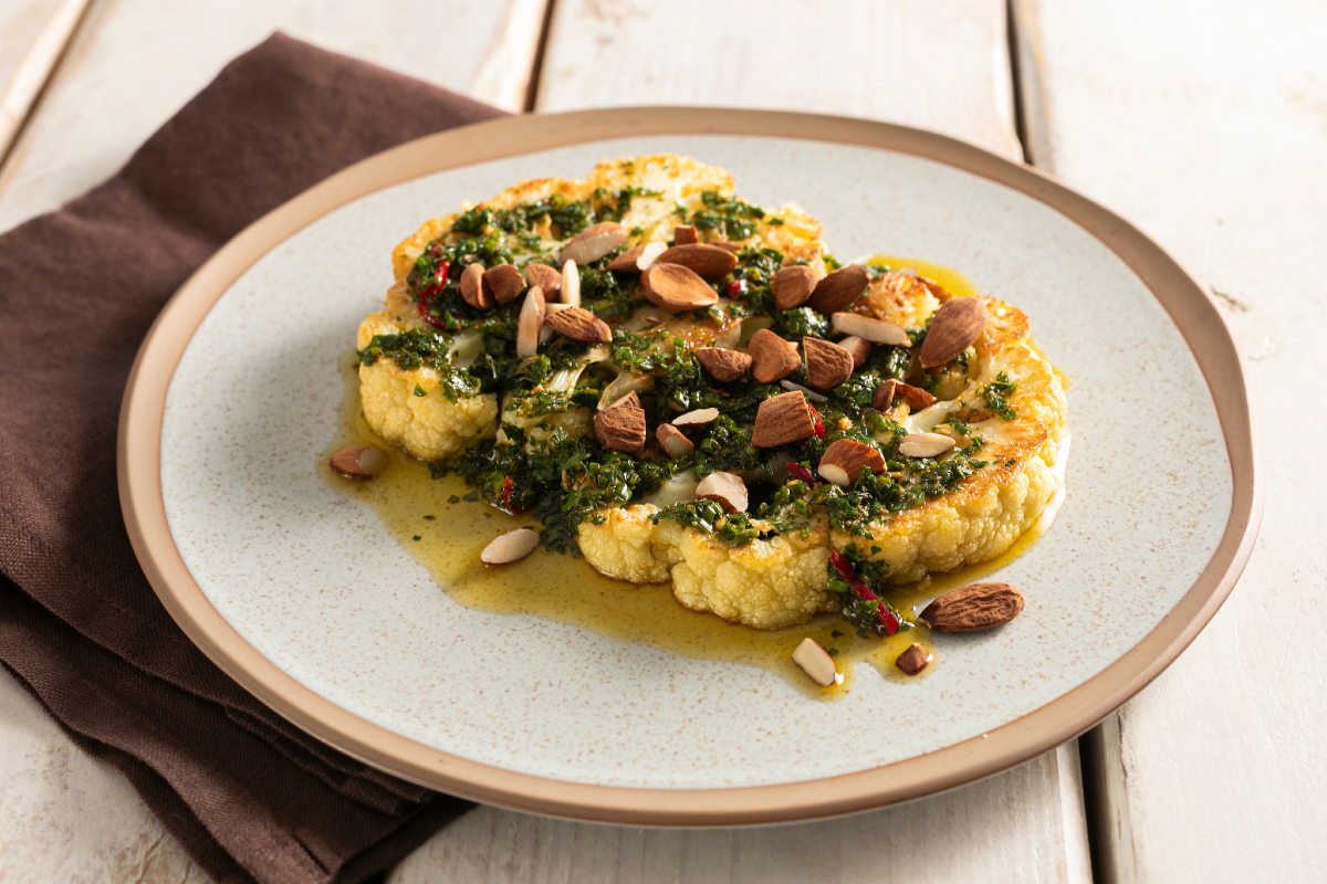 Roasted cauliflower with almonds and green sauce