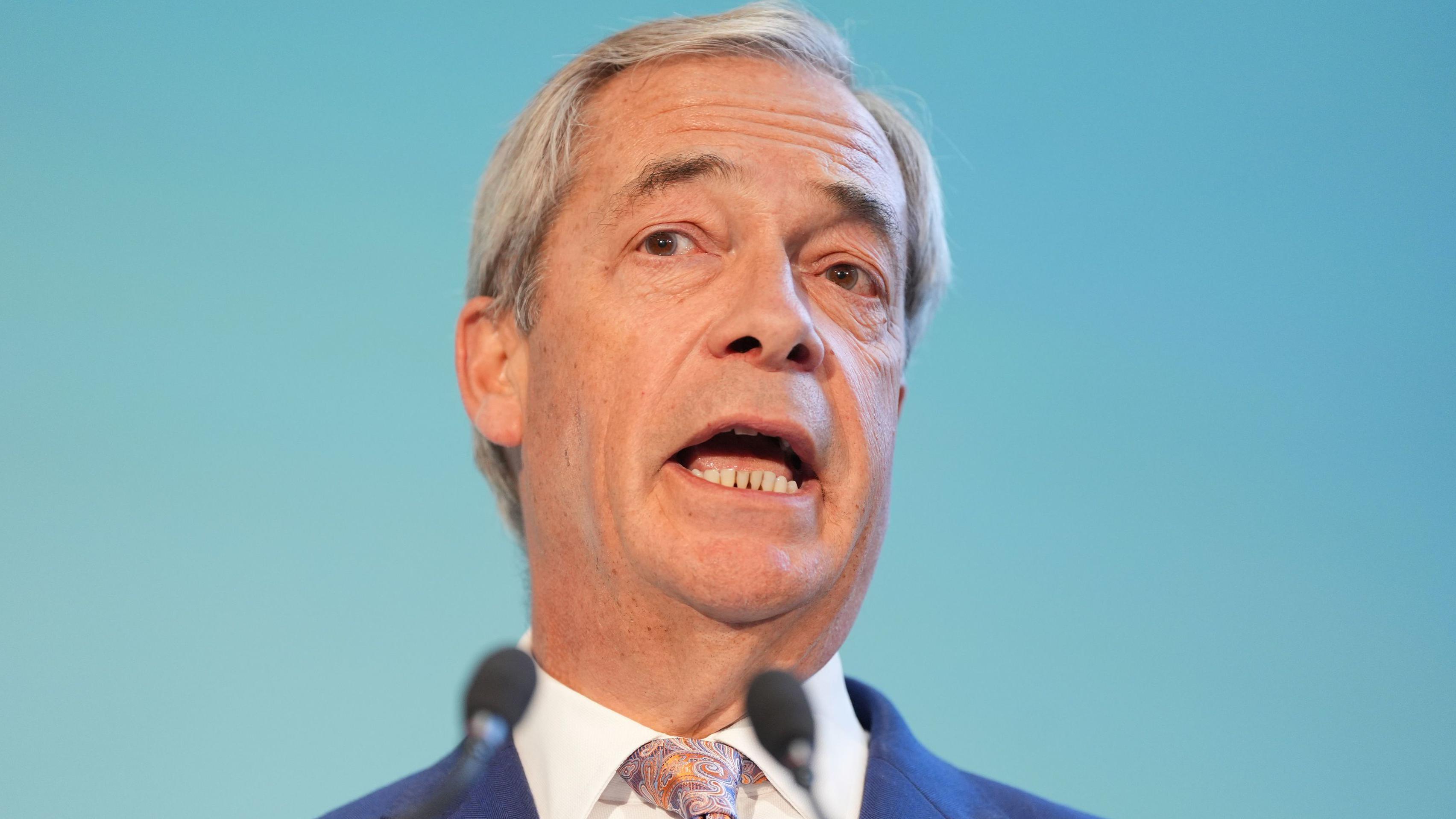 Starmer labels Farage 'spineless' over handling of racism claims