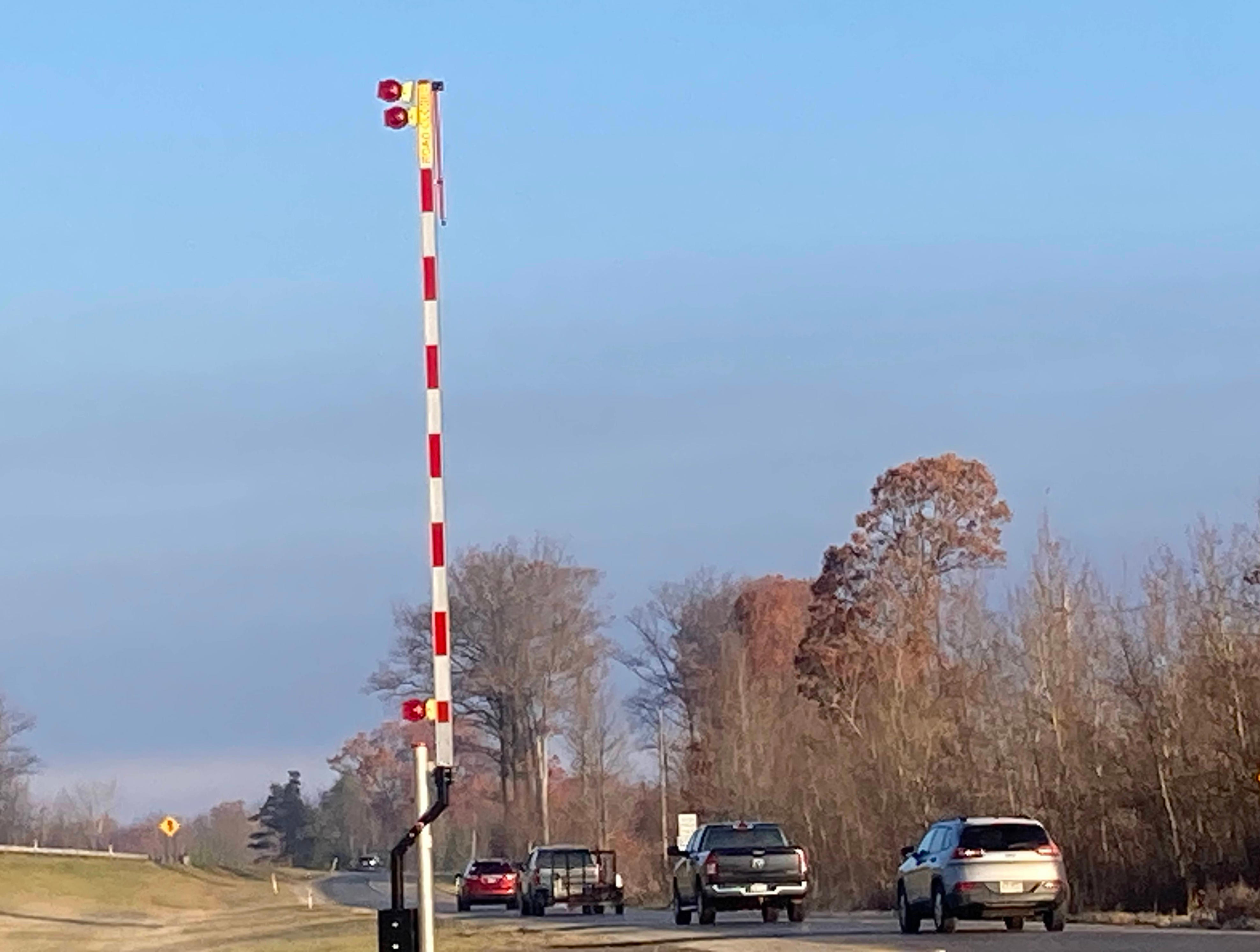 Striped poles have appeared at interstate on-ramps in Erie County. Here ...