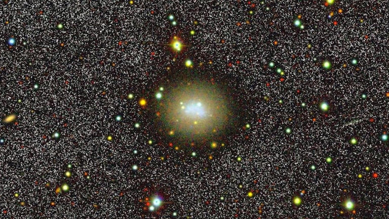 Mysterious galaxy trapped in 'the void' keeps churning out stars ...