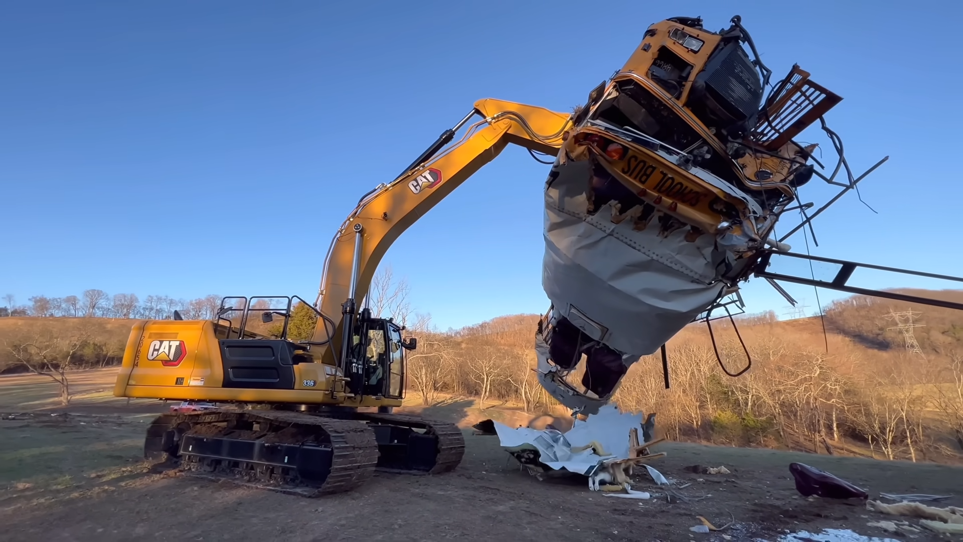 Huge Excavator Throws School Buses Around Like Toys