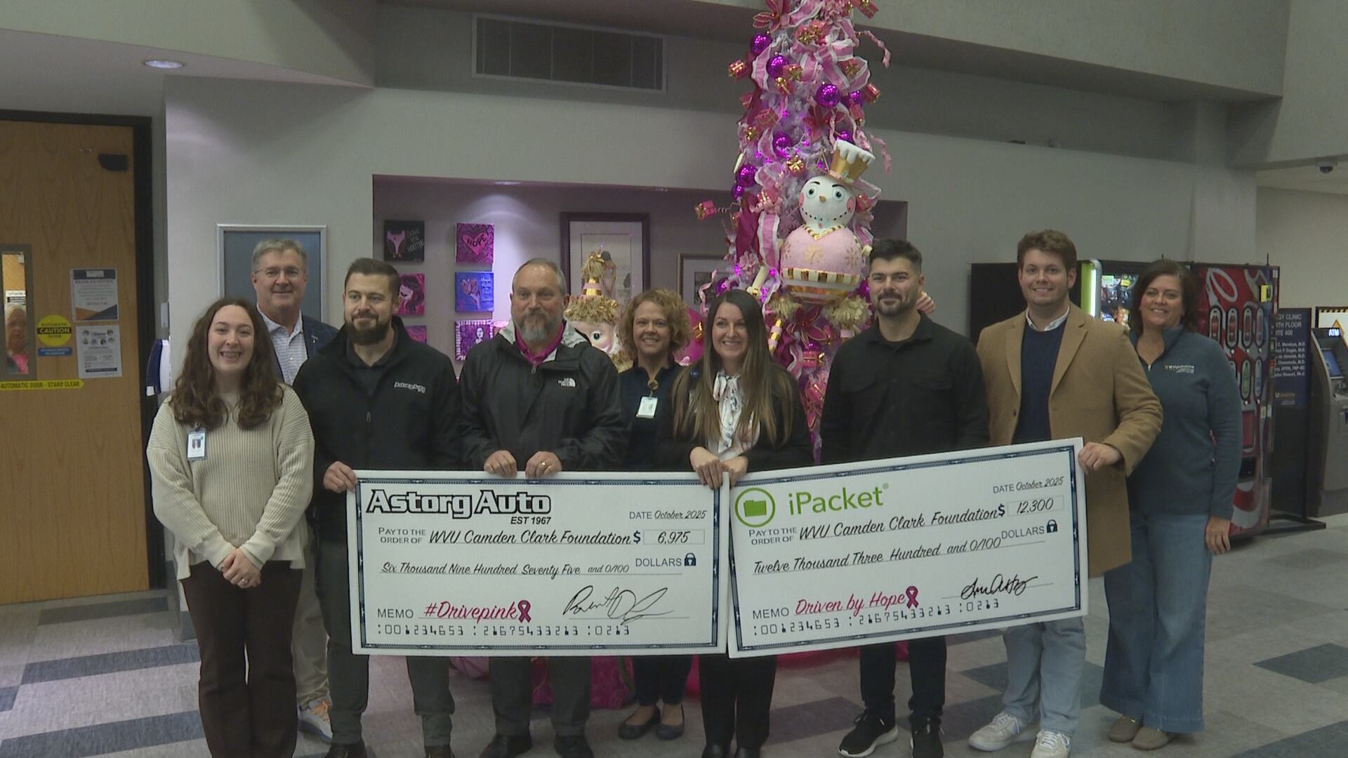 Astorg Auto & iPacket donate to CCMC’S Pink Mammogram Fund