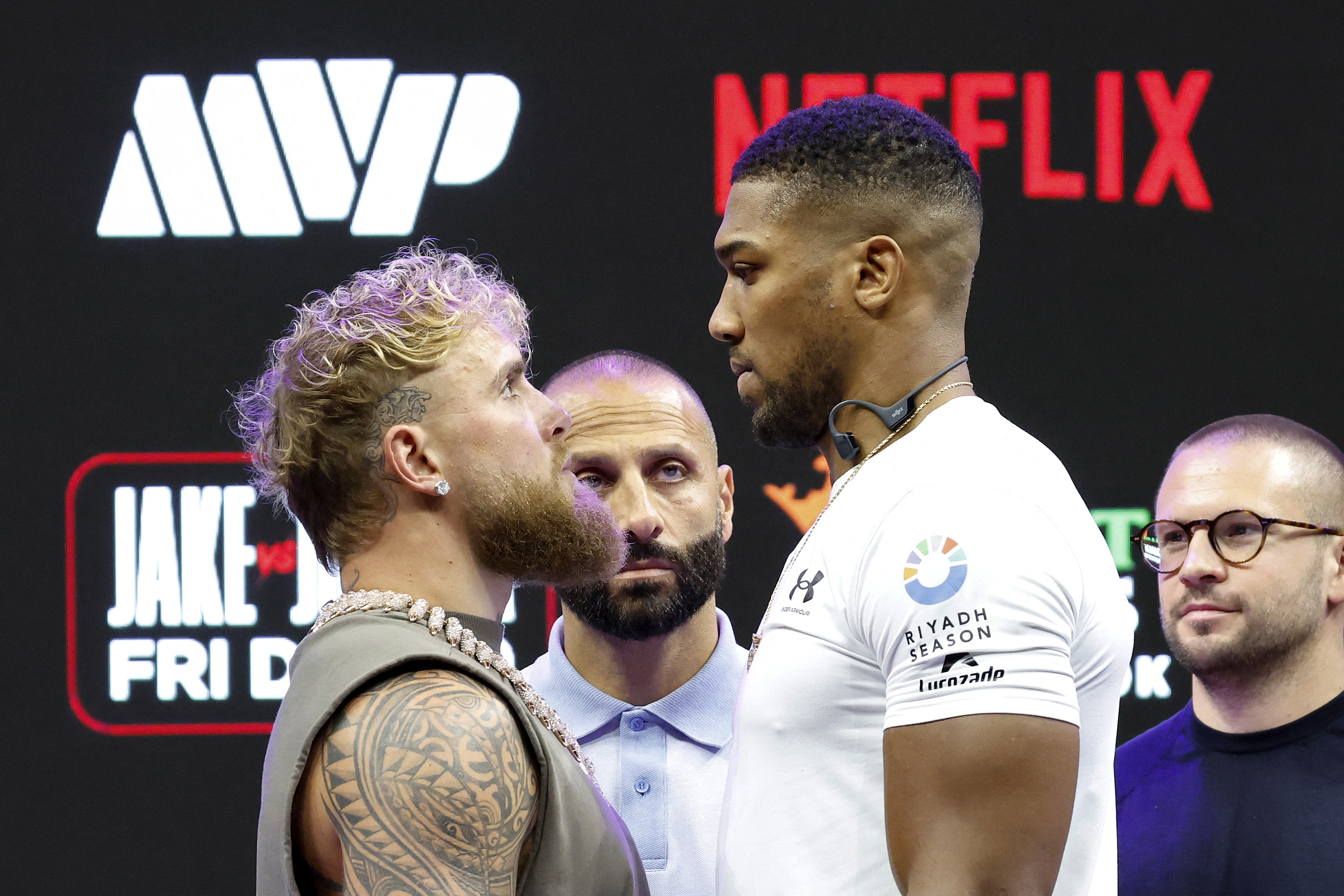 Jake Paul dwarfed by Anthony Joshua in heavyweight fight face-off