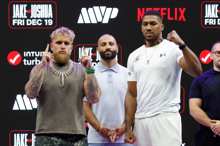 Jake Paul dwarfed by Anthony Joshua in heavyweight fight face-off