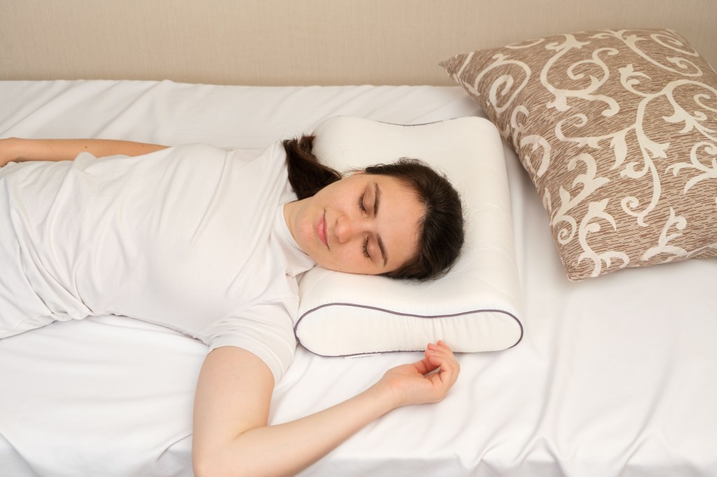 Chiropractor shares best sleeping position for people who sit down all day