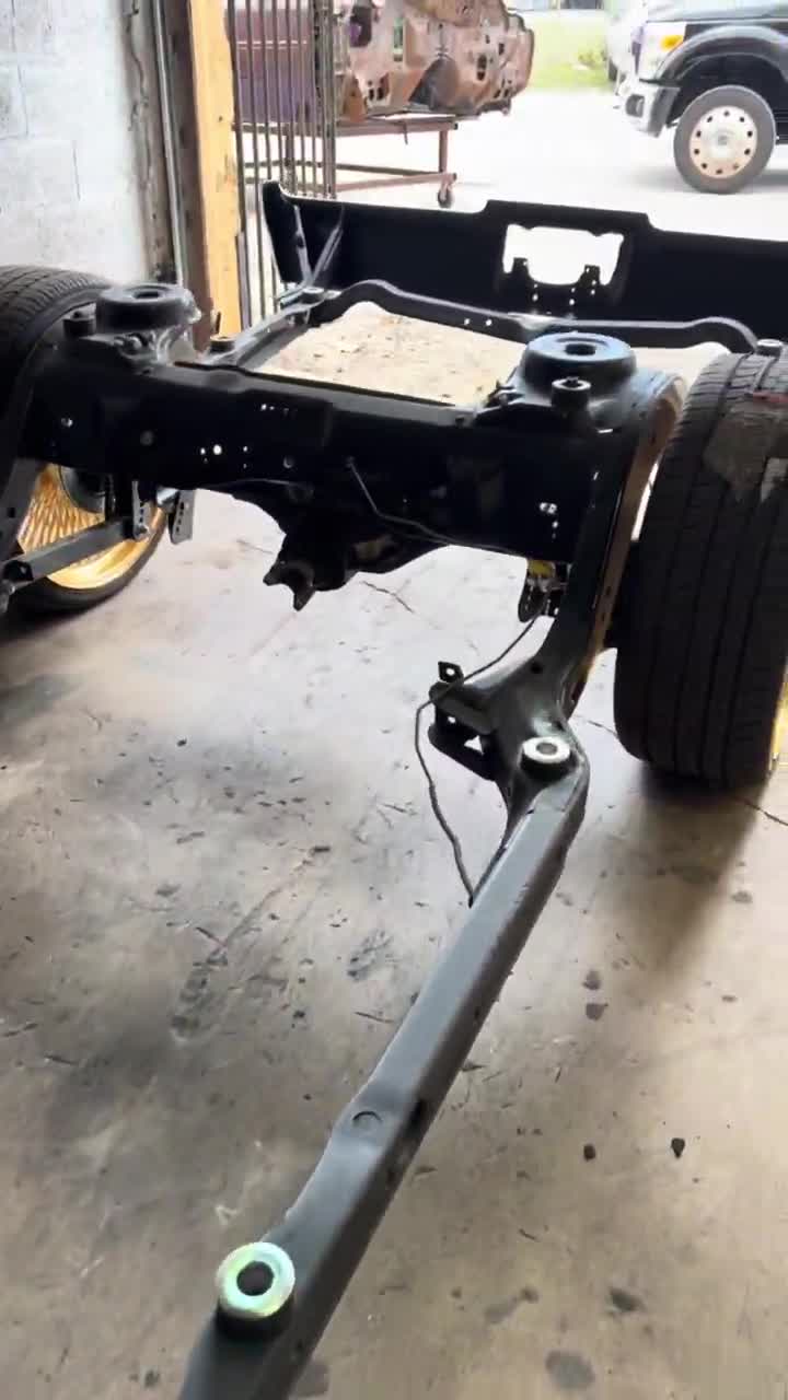 Frame-off 71 Chevy vert on gold 24's Daytons at Blue-Magic built