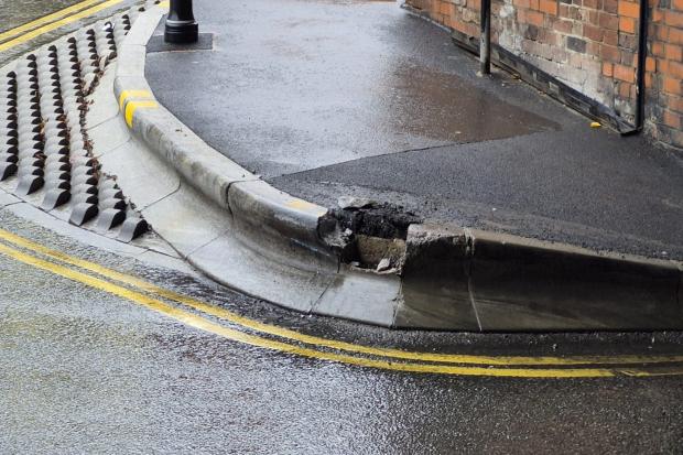 'Killer kerb' suffers huge damage as car transporter leaves dangerous hole