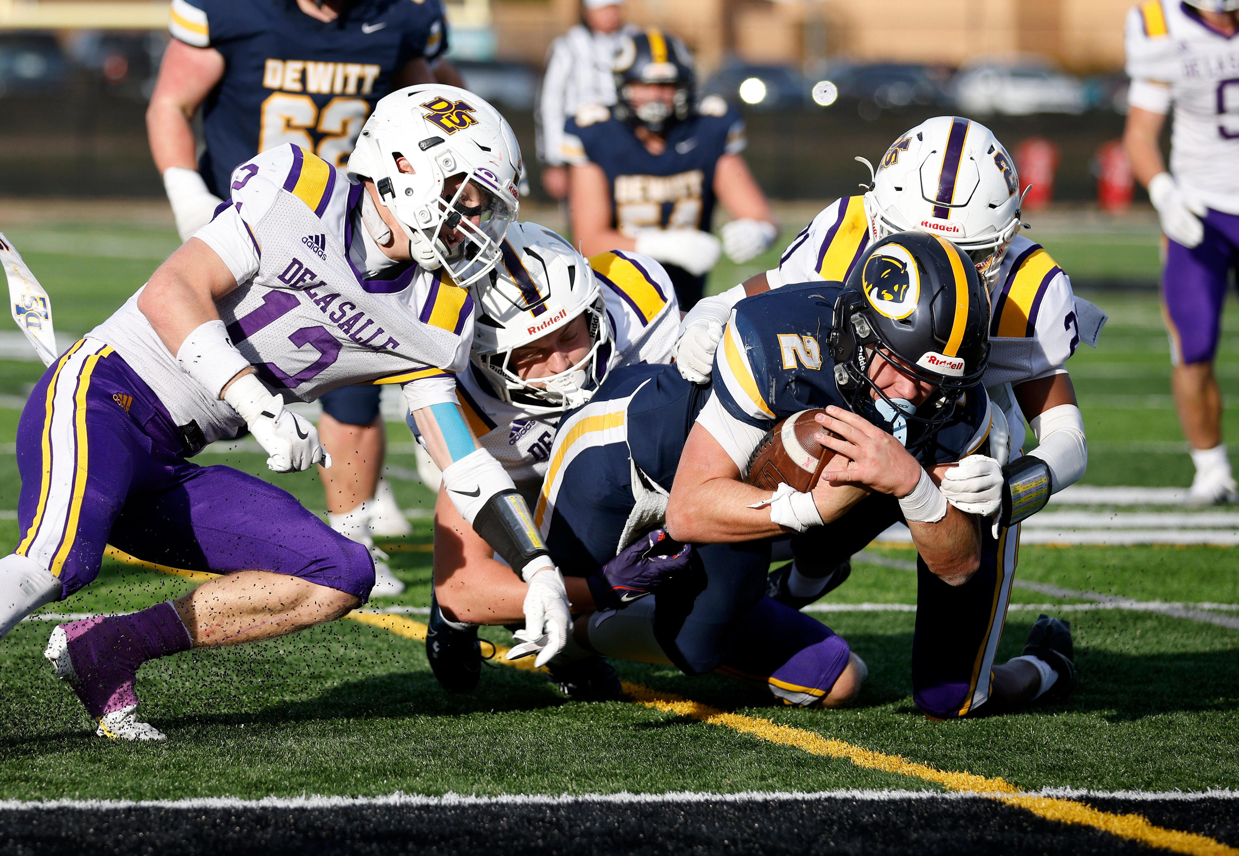 Trav Moore's 320 yards, 4 TDs lift DeWitt football to semifinal win