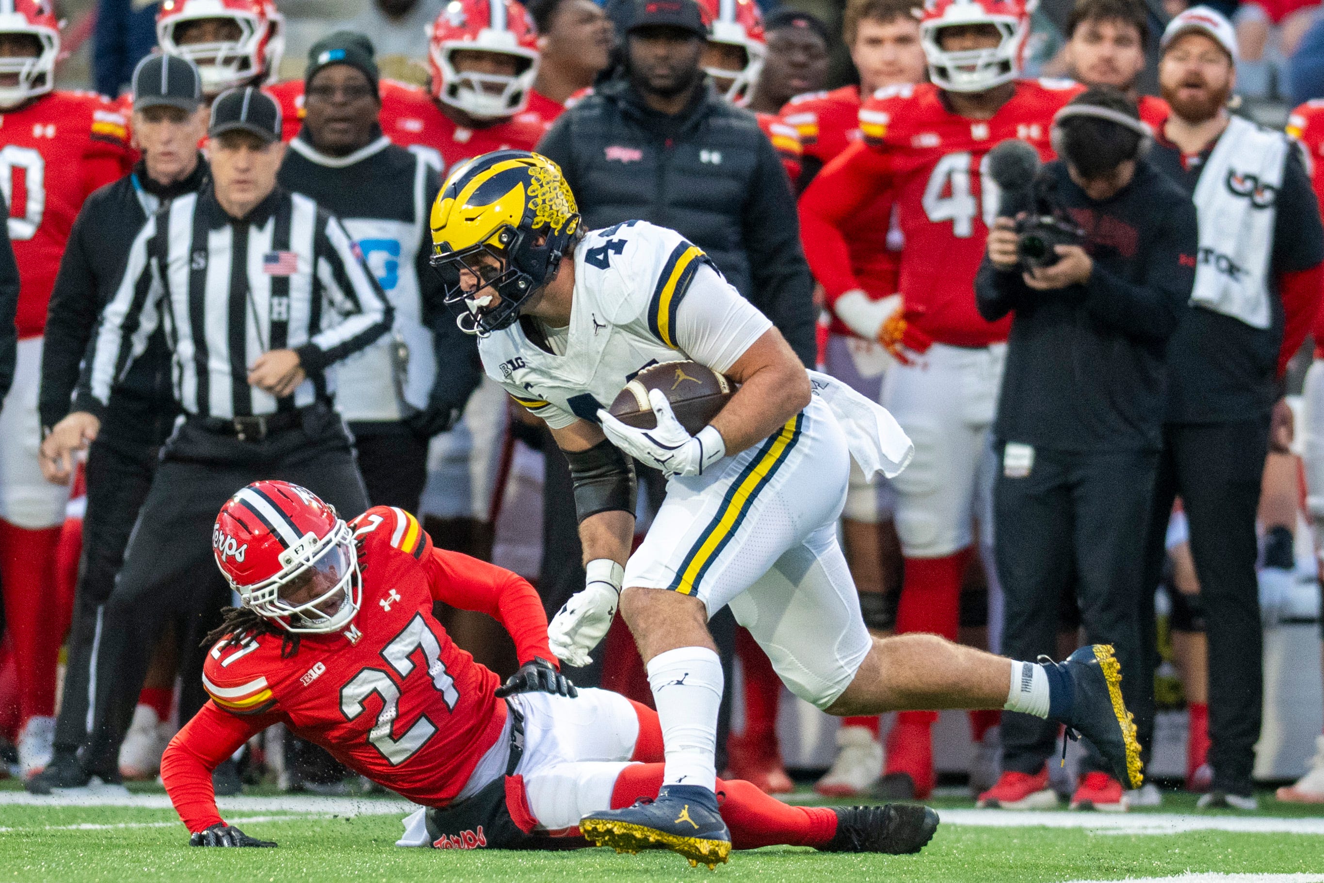 Michigan captain Max Bredeson in walking boot after injury vs Maryland