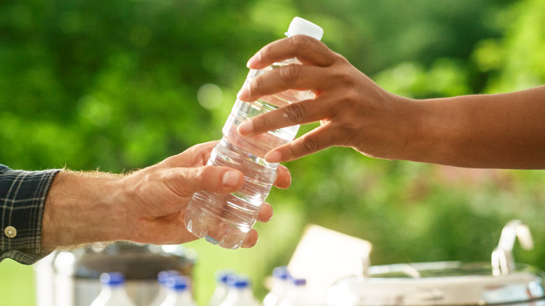 An Affordable DIY Shoe Rack That'll Make Use Of Your Empty Water Bottles