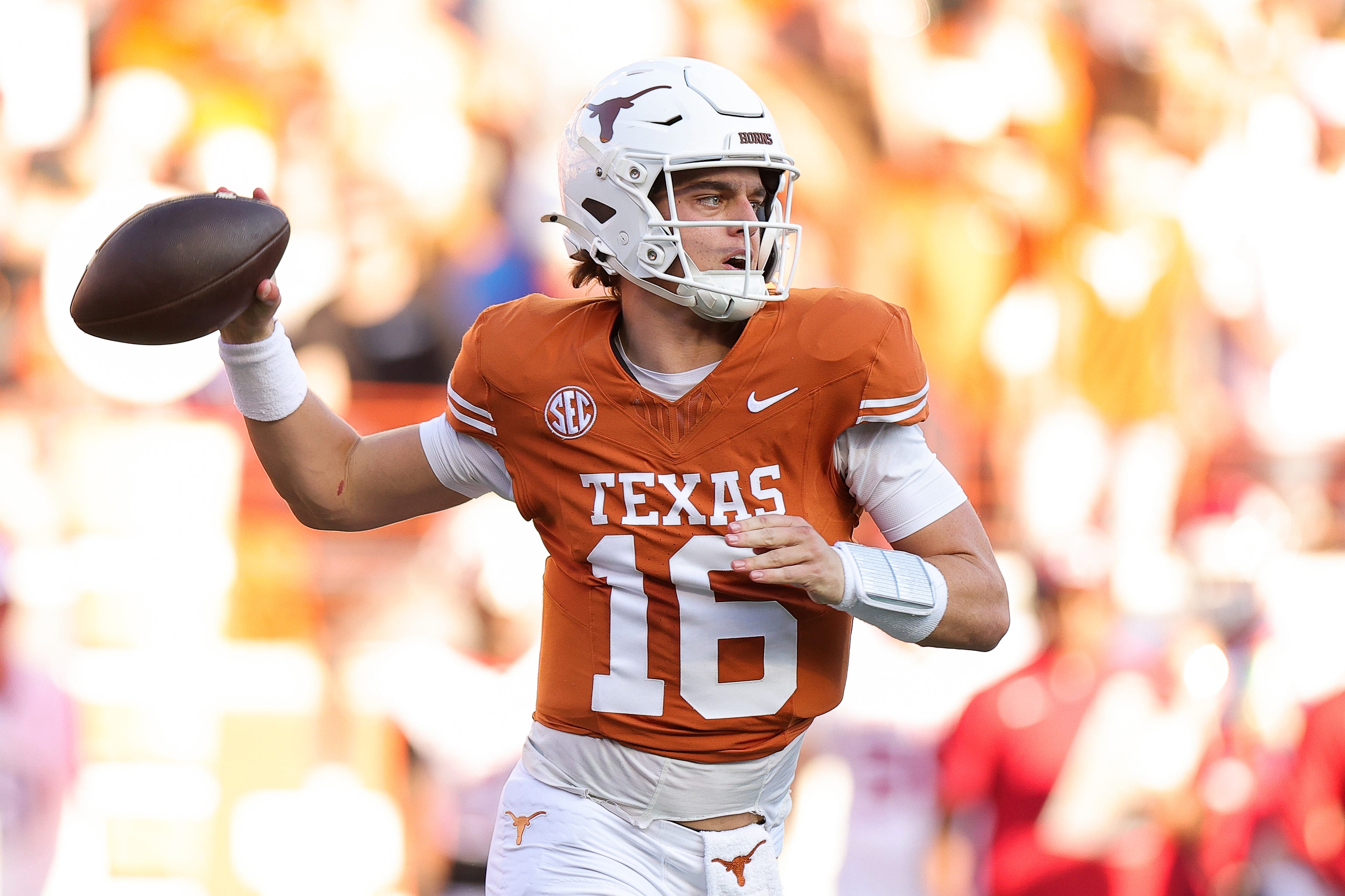 RAPID RECAP: Peak Manning scores six TDs as Texas roasts Hogs, 52-37