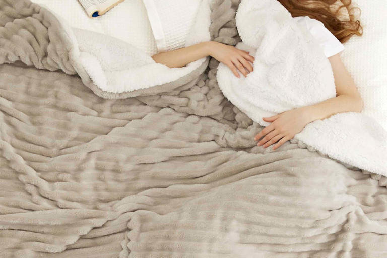 I don’t have $249 to spend on the viral Lola blanket, but my go-to cozy ...