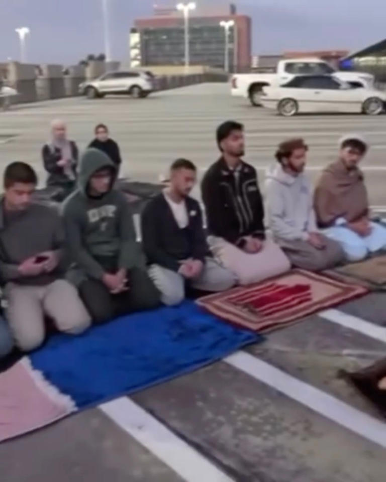 Three charged for shouting slurs at praying Muslim students while ...