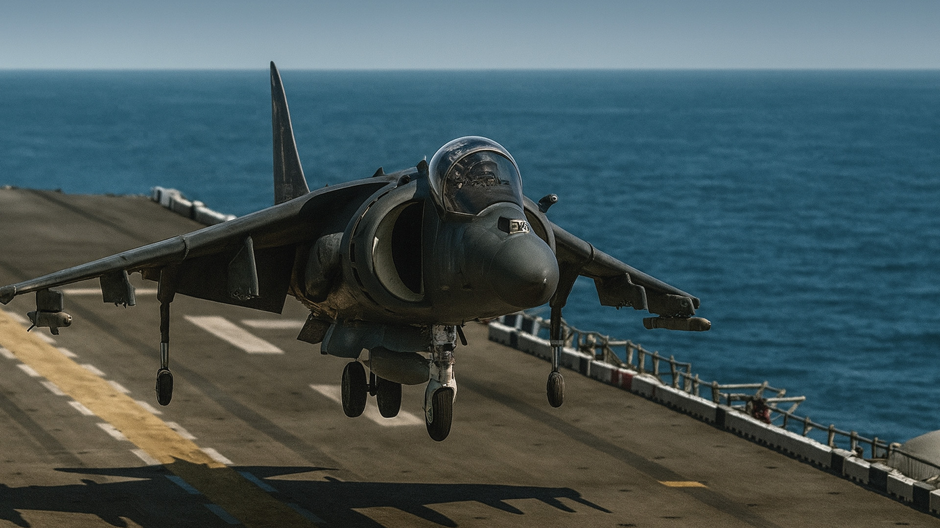 Harrier Jets Land Aboard USS Iwo Jima During Training