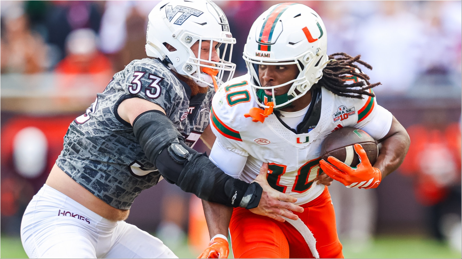 Miami's Malachi Toney Sends Woman Flying in Scary Sideline Collision Video
