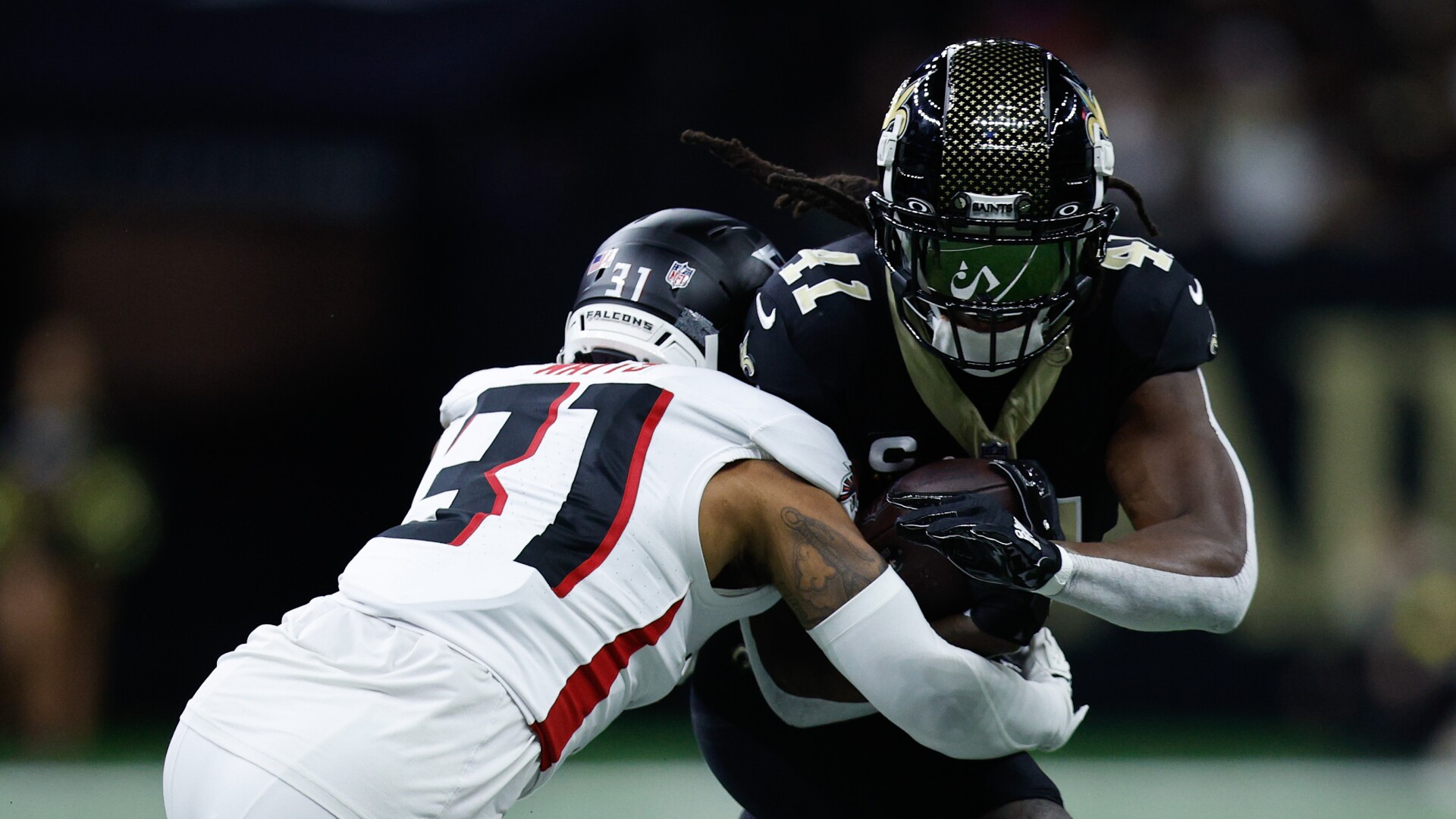 Alvin Kamara leaves with knee injury, Justin Reid interception return ...