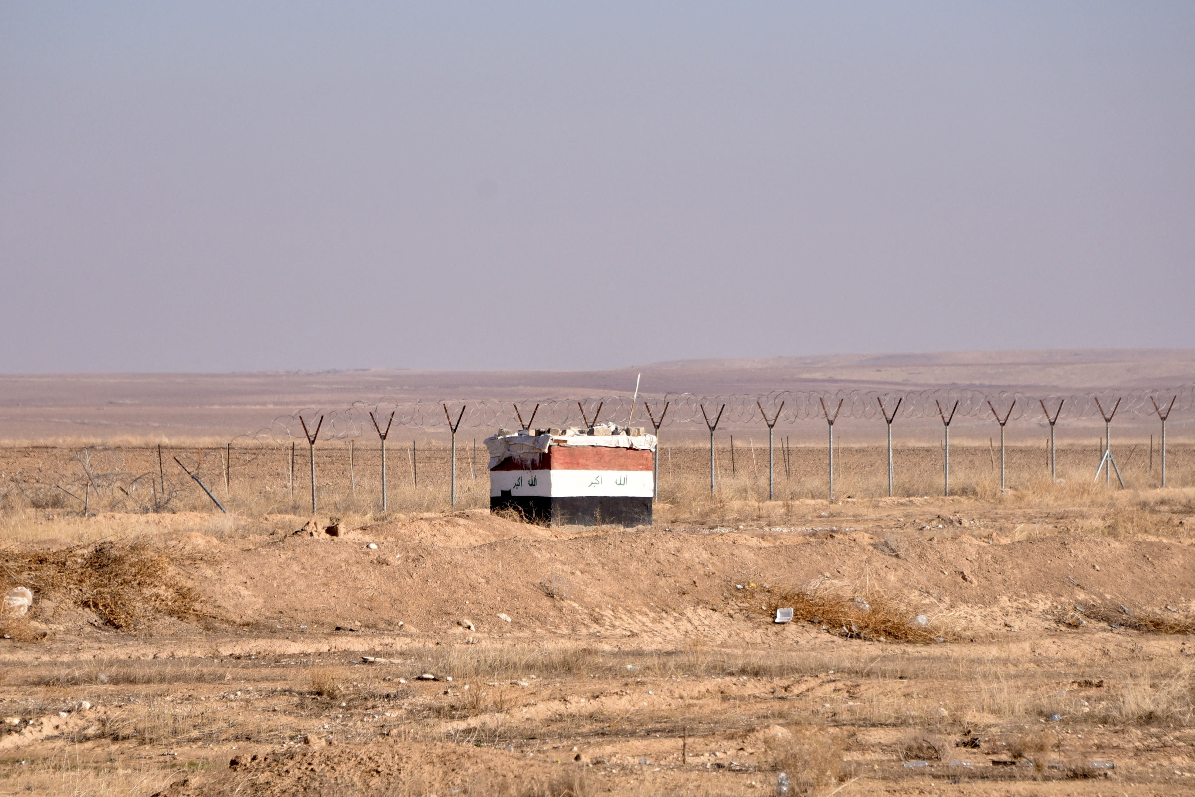 Iraq pushes for Syrian border wall, threatening Iran's regional influence