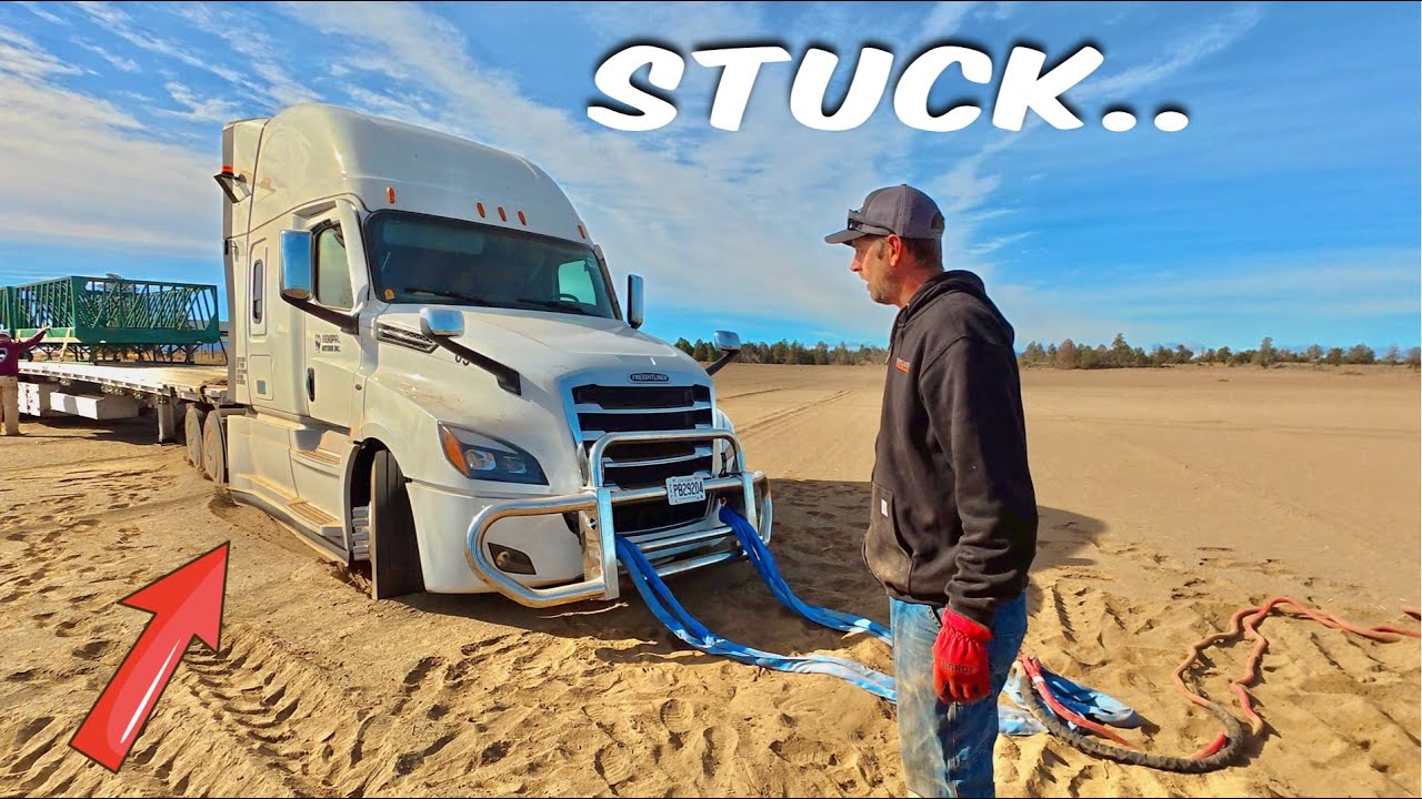 Unexpected truck recovery in a farm field!