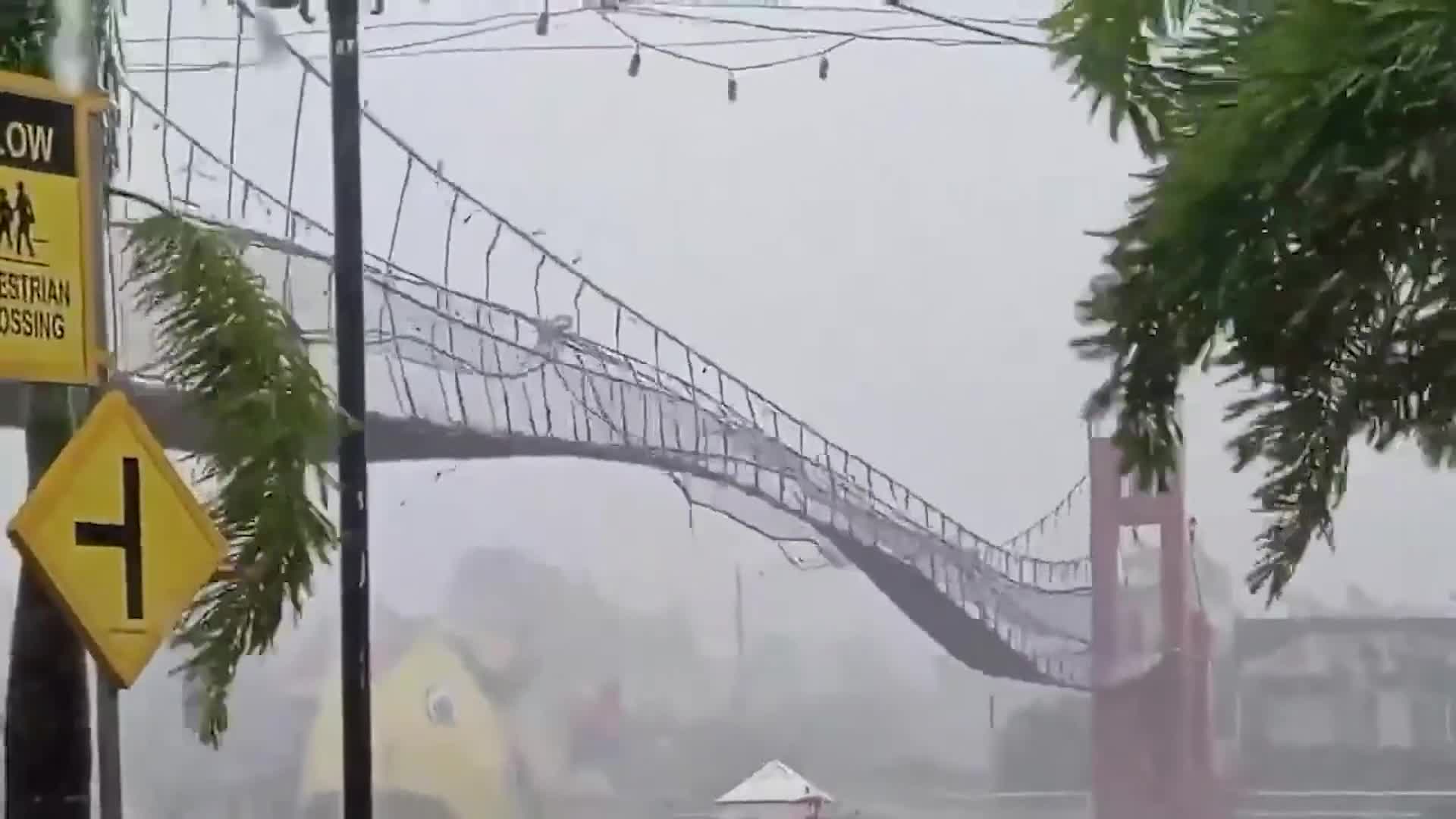 Typhoon Fung-Wong rocks walking bridge in Philippines