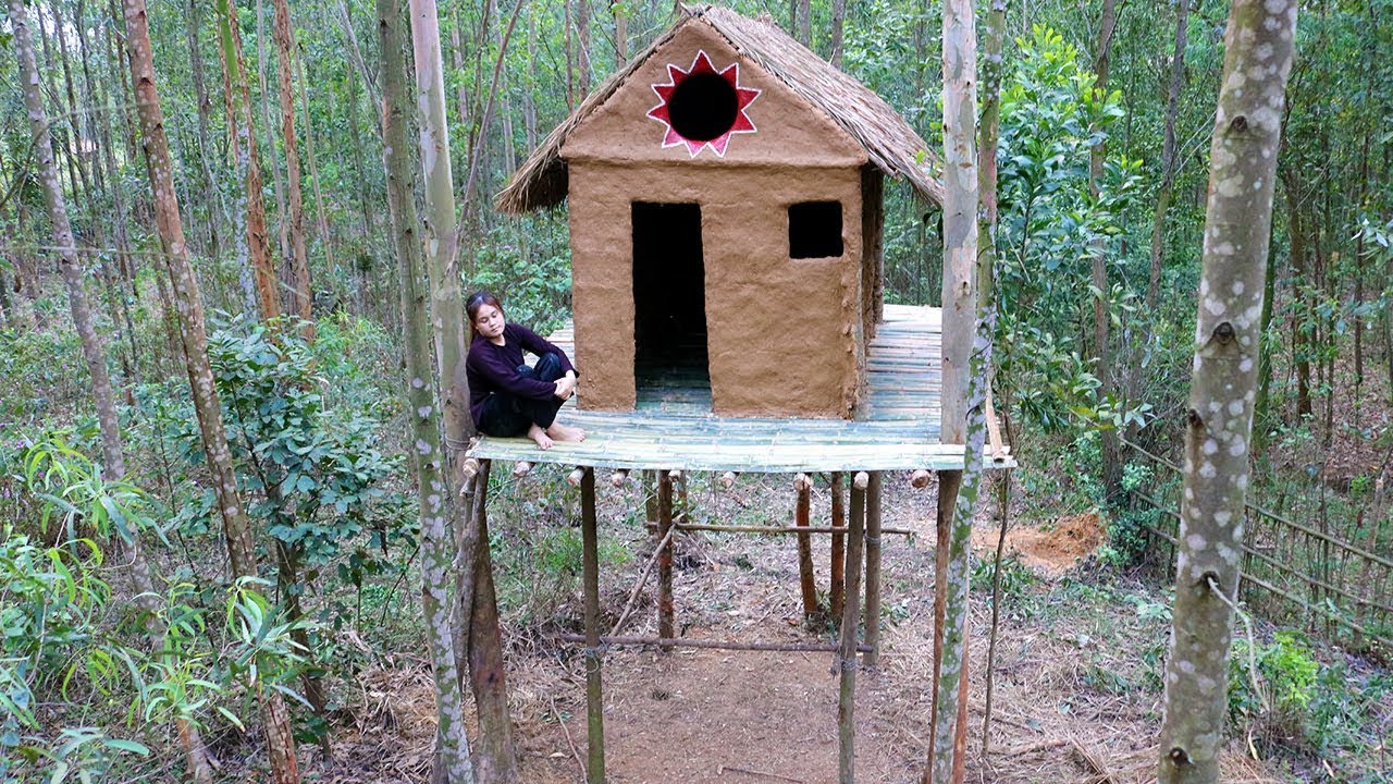 Water slide to swimming pool in the forest