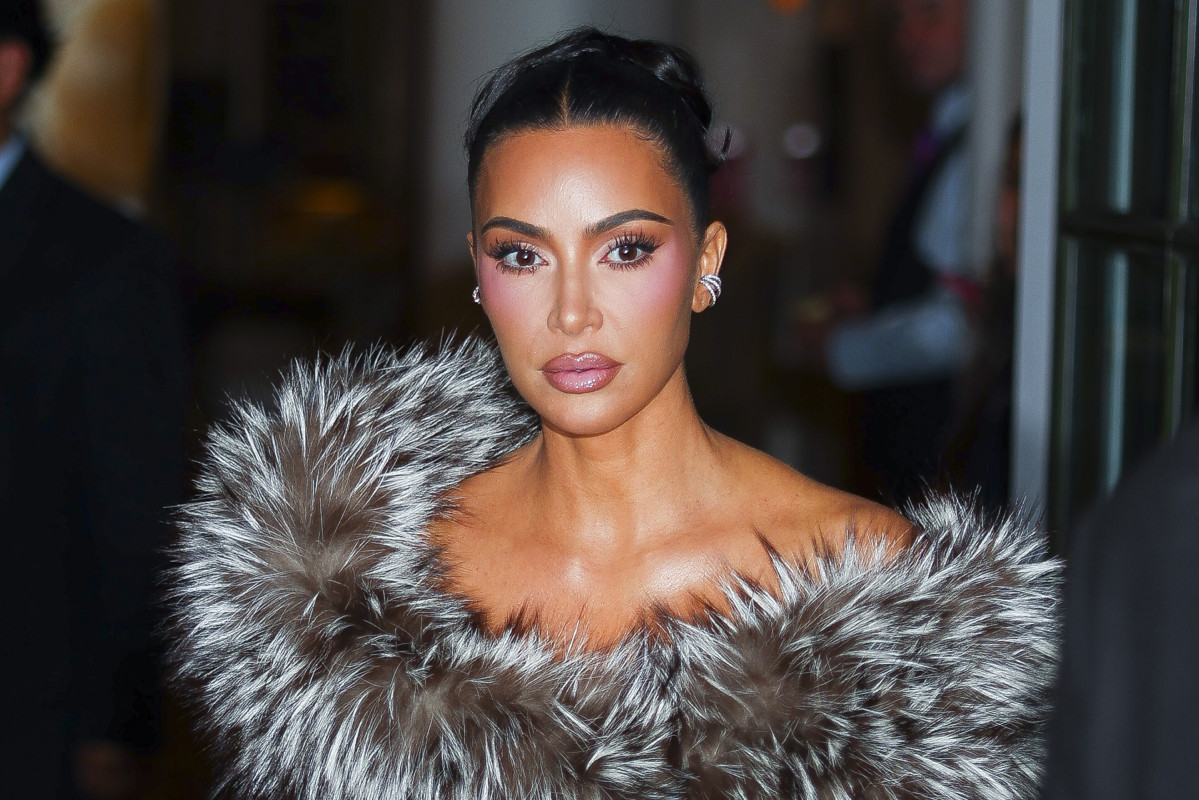 Kim Kardashian Channels Halle Berry’s Iconic Bond Girl Look for Kris Jenner’s 70th Birthday Bash