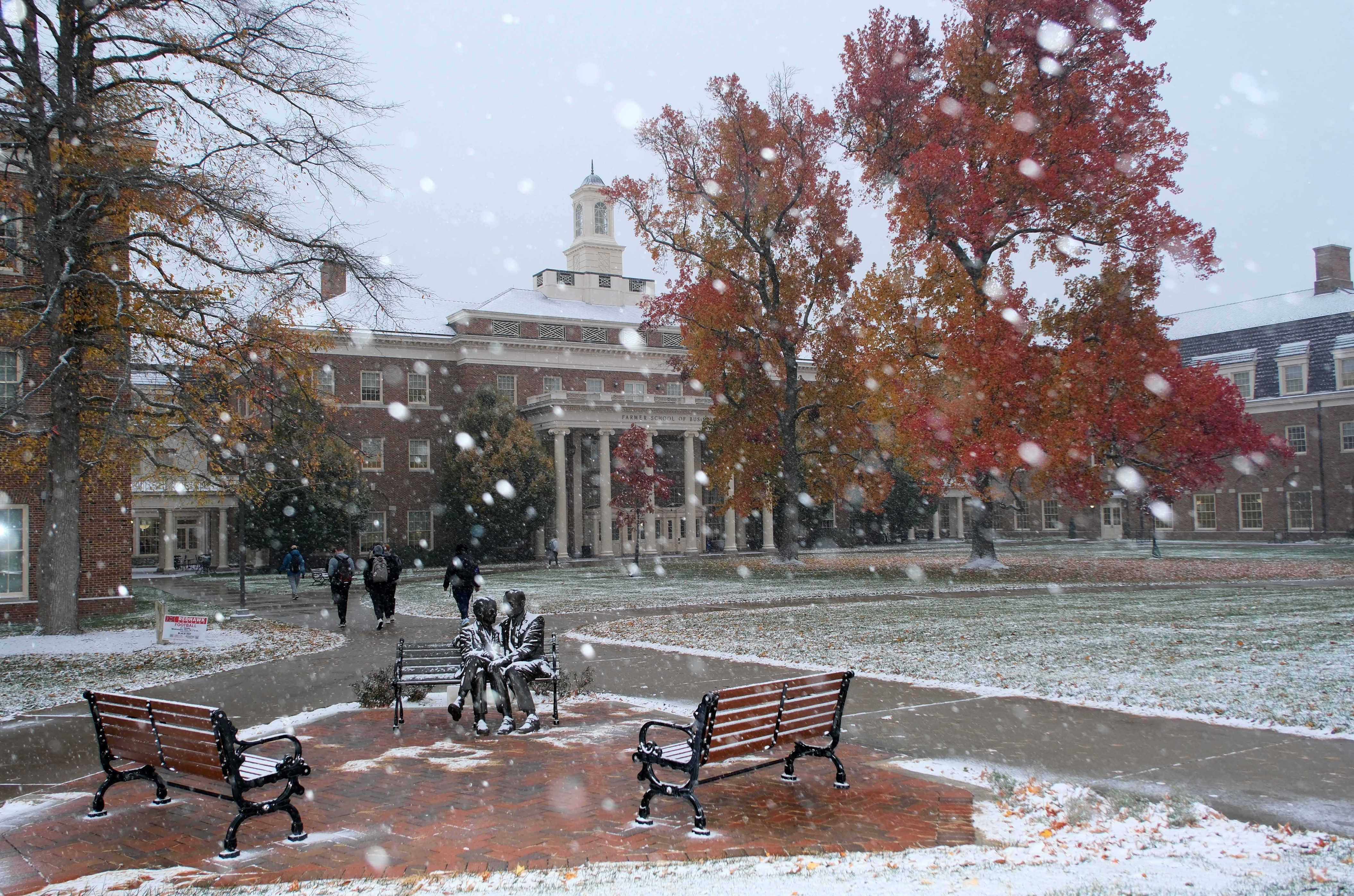 Record snow wraps up in Cincinnati; bitter cold settles in