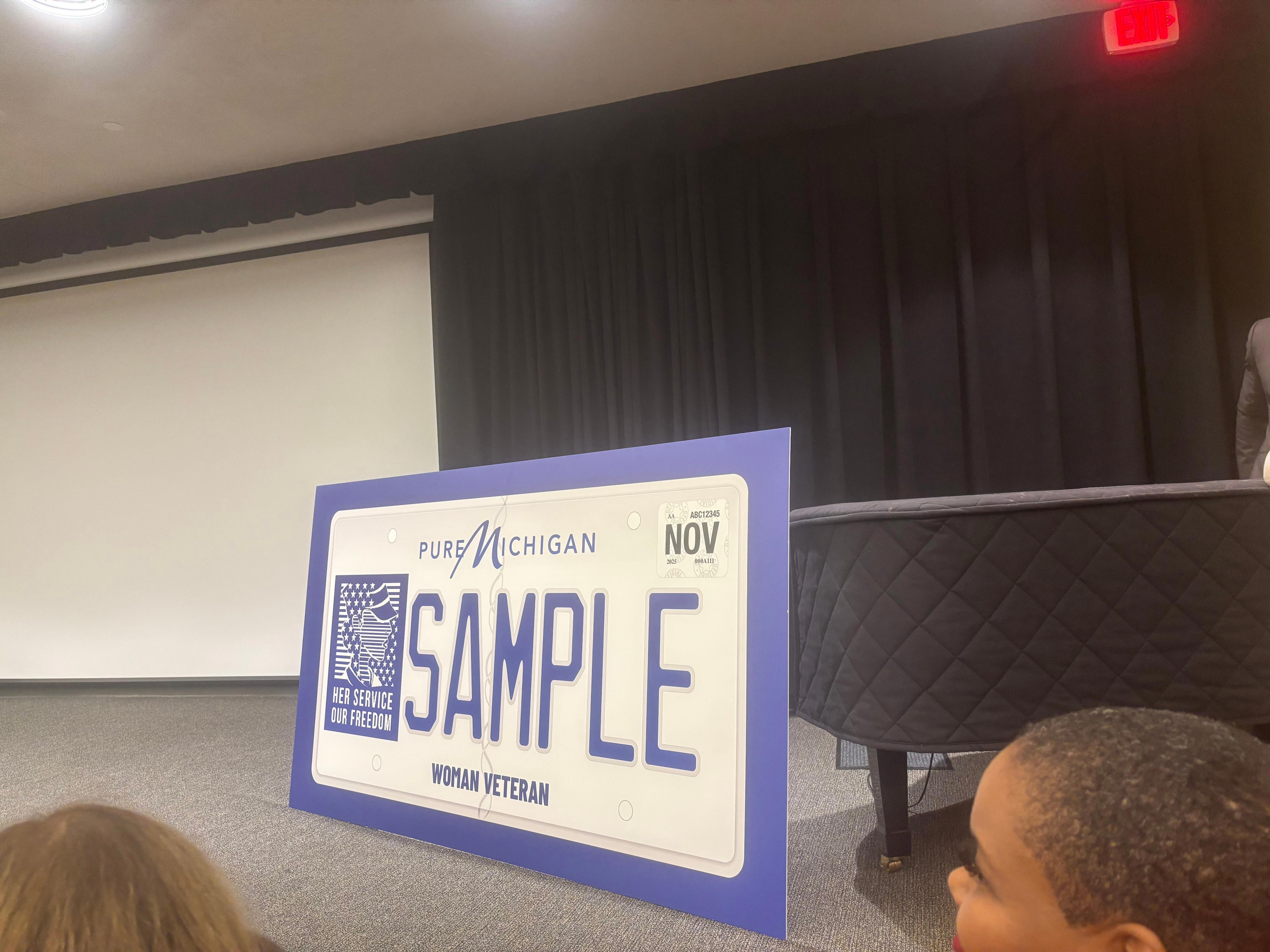 Michigan state officials unveil new license plate that honors women ...