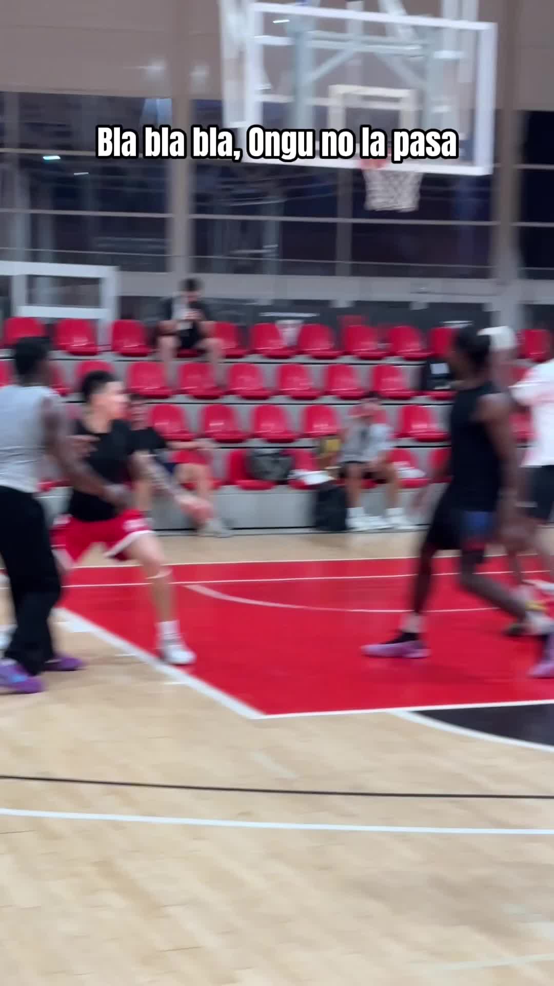 Intense Basketball Plays during a Competitive Indoor Game