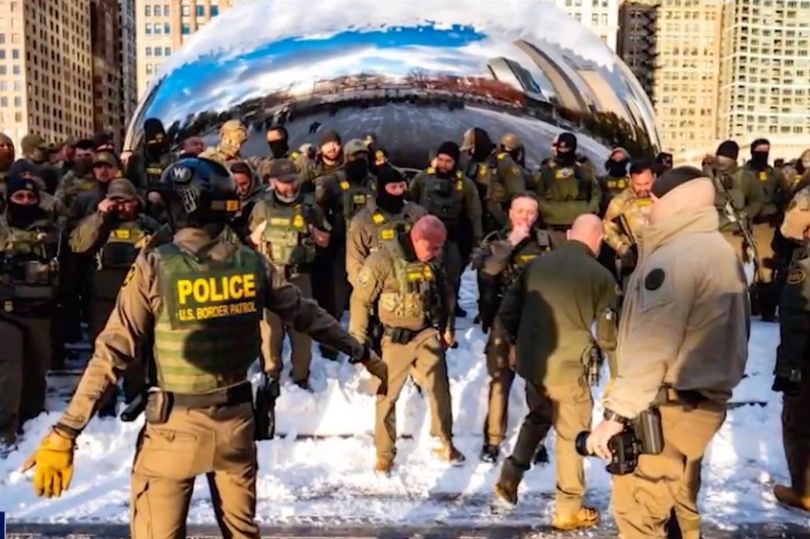ICE agents pose at 'The Bean' for photoshoot after Chicago suburb raids