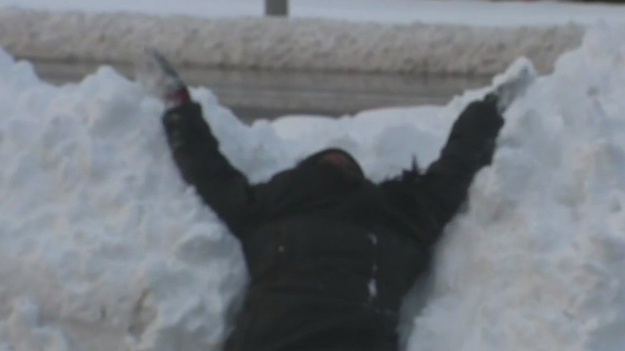 NW Indiana covered by snow, to Fox 32's Tia Ewing's delight!