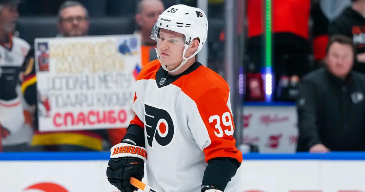 Sean Couturier appears to burry Matvei Michkov.