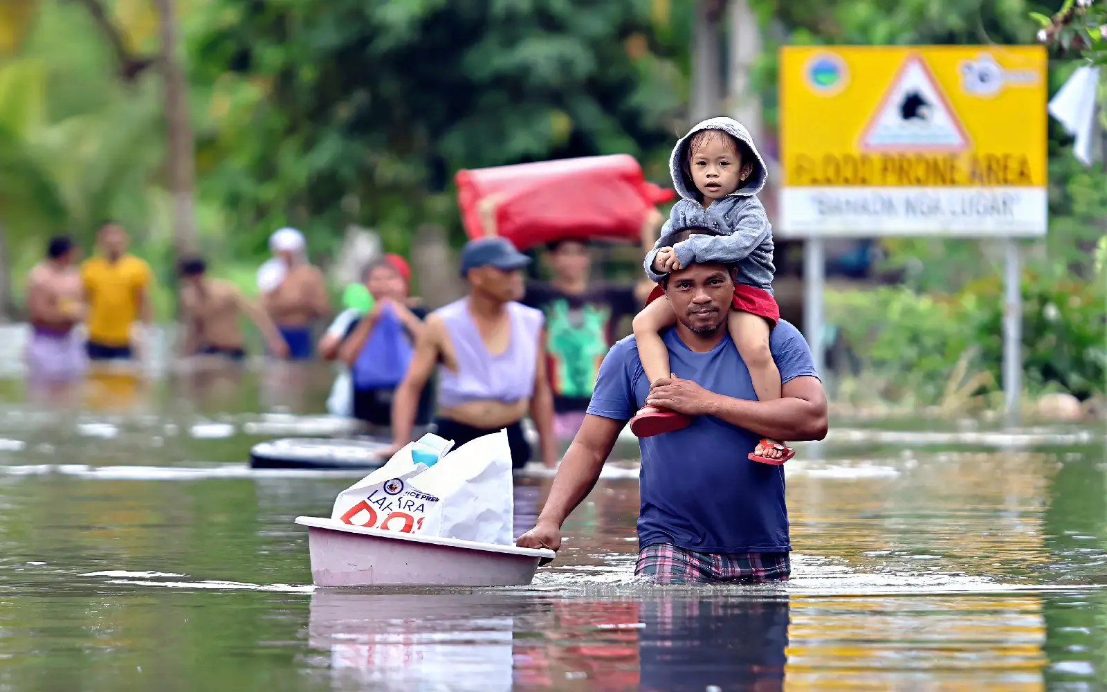 Philippines digs out from Typhoon Fung-wong as death toll climbs to 18