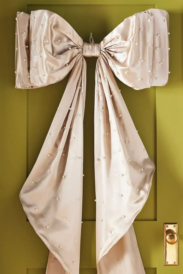 Anthropologie's Bow Tree Topper Is Also a Chic Door Bow