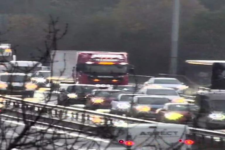 BMW driver dies after M74 rush hour crash sees police shut down road ...