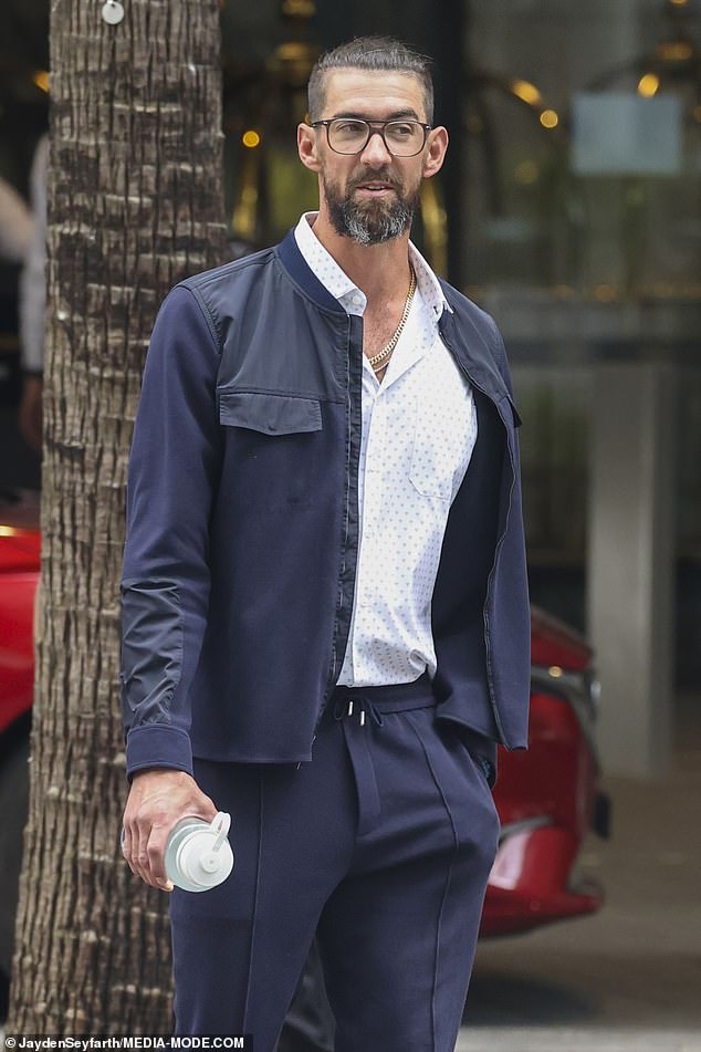 Michael Phelps doesn't look like this anymore: Olympian strolls through ...