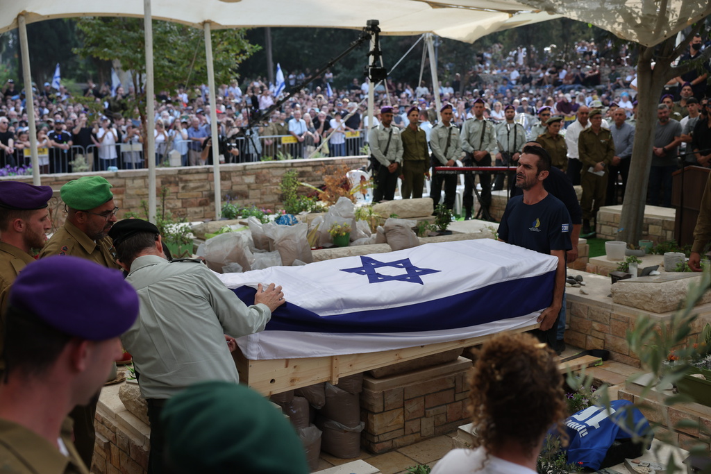 Tens of thousands attend funeral of Israeli soldier whose remains were ...