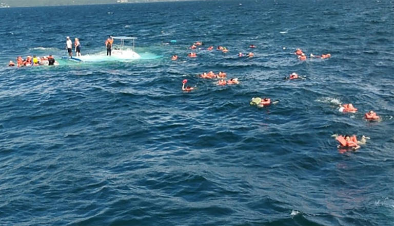 Over 50 cruise ship passengers left floating in sea after boat sinks