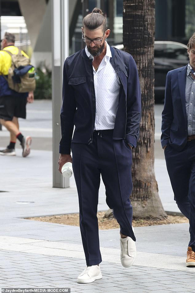 Michael Phelps doesn't look like this anymore: Olympian strolls through ...