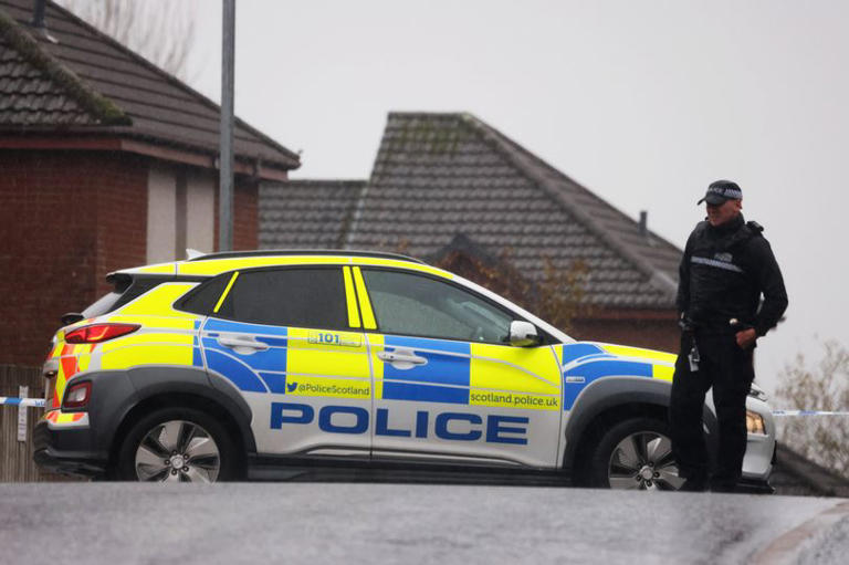 Forensic cops comb Greenock street as blue tent erected in garden