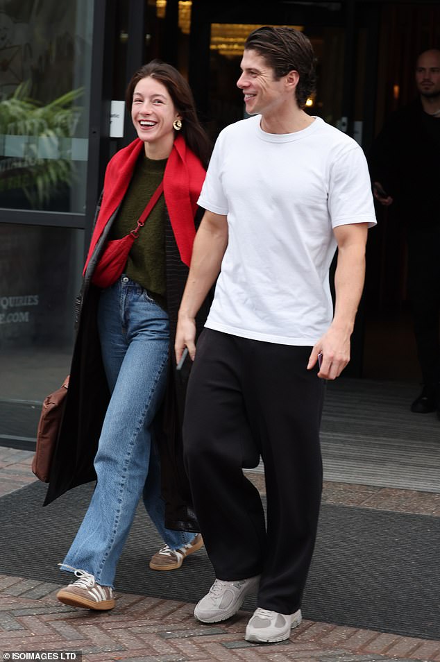 Strictly's Lewis Cope beams as he steps out with his rarely-seen ...