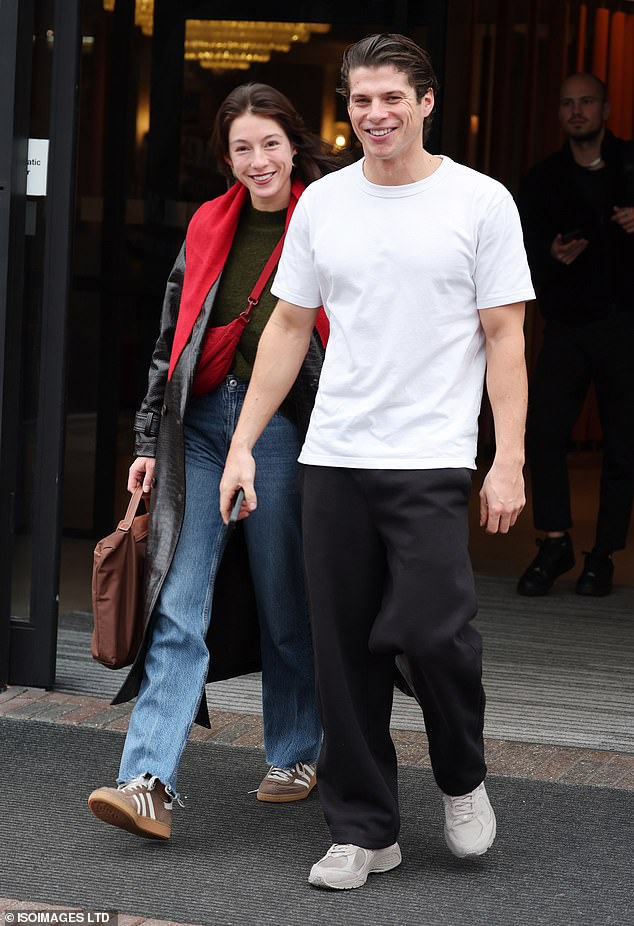 Strictly's Lewis Cope beams as he steps out with his rarely-seen ...