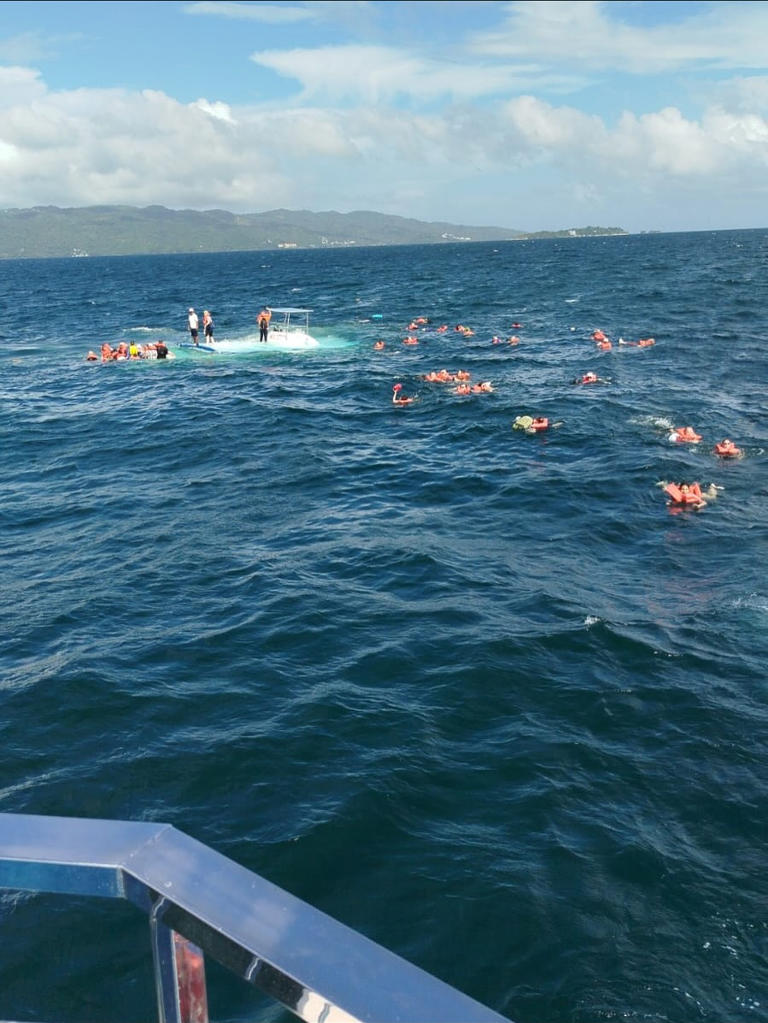 Cruise ship passengers stranded at sea after boat sinks off the coast ...