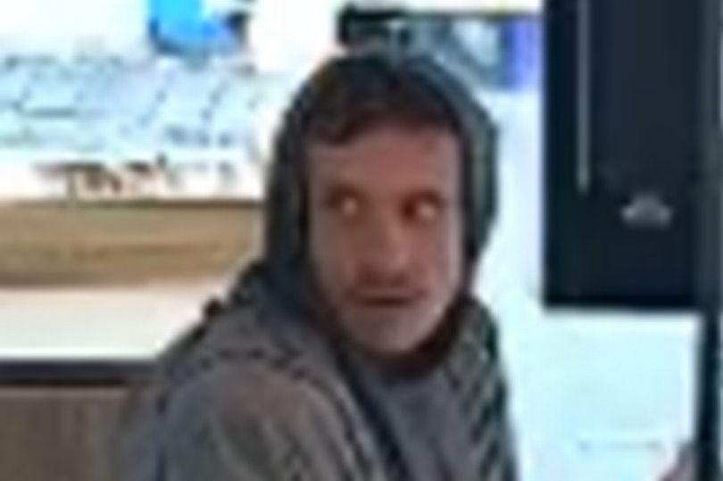 Greggs worker attacked in sandwich raid as police appeal over grinning man