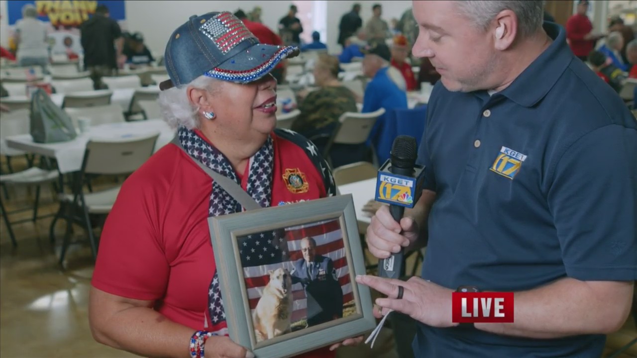 Kevin talks to widow of veteran Jim Lopez at Veterans Day breakfast
