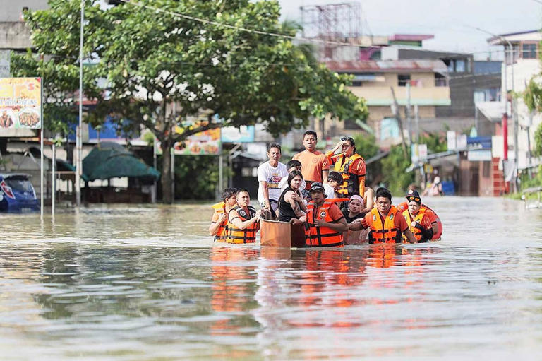 Philippines digs out from Typhoon Uwan as death toll climbs to 18