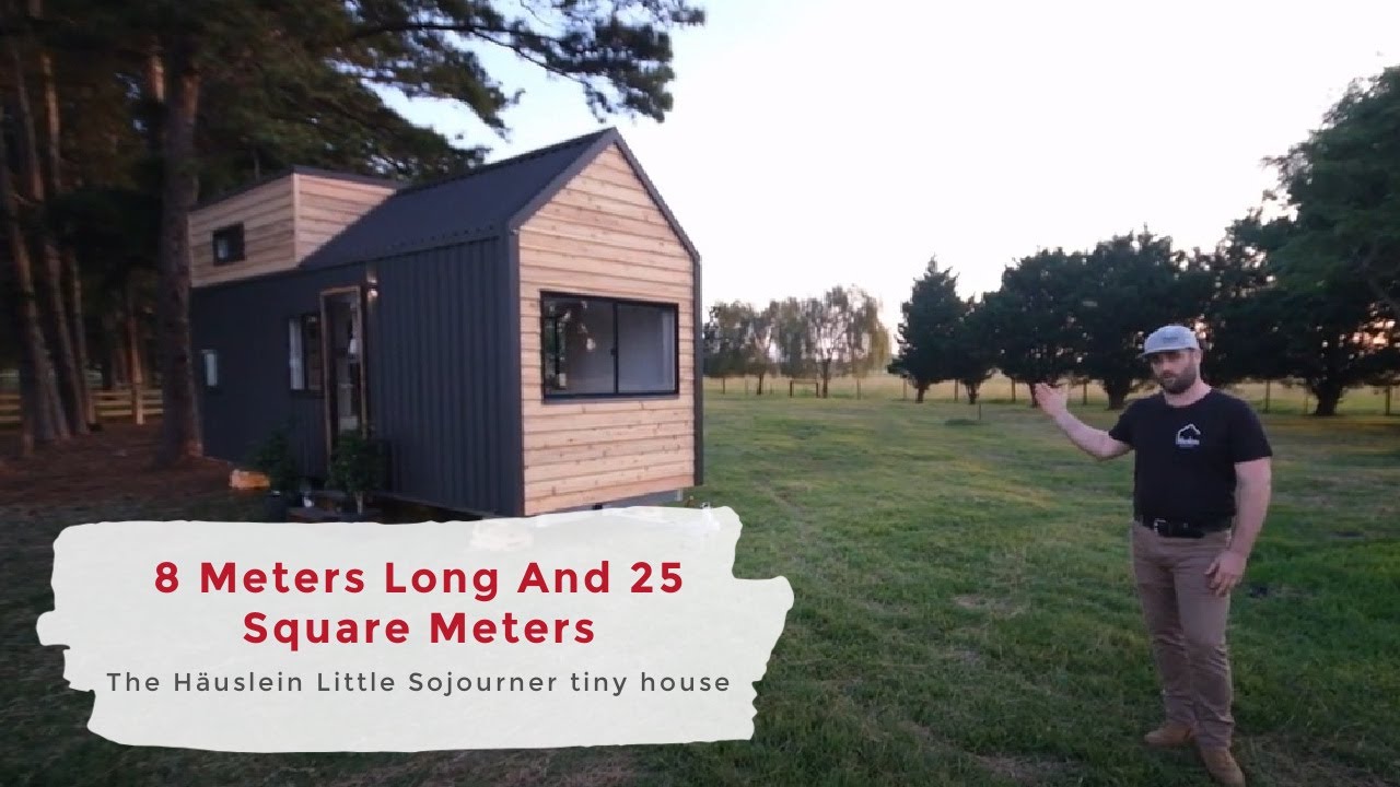 Moving into a tiny house on wheels which accommodates a queen-size bed ...