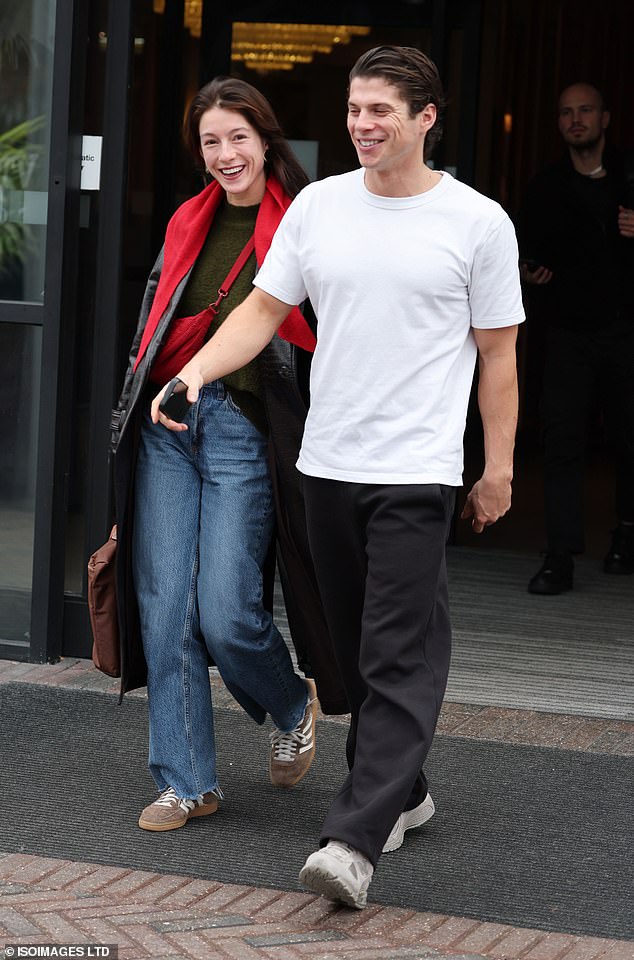 Strictly's Lewis Cope beams as he steps out with his rarely-seen ...