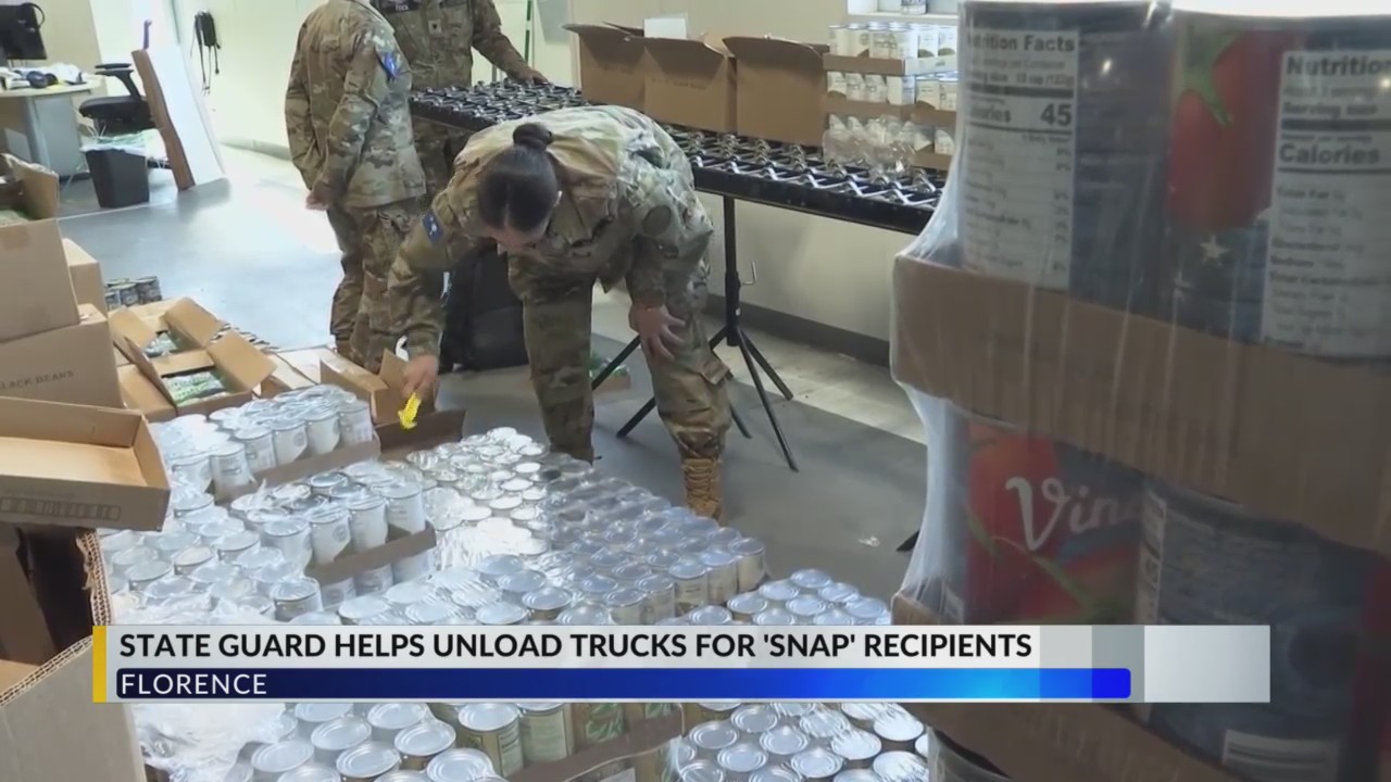 South Carolina State Guard helps unload trucks for SNAP recipients