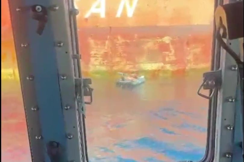 Rescue operation launched after bloke seen floating in sea on ...